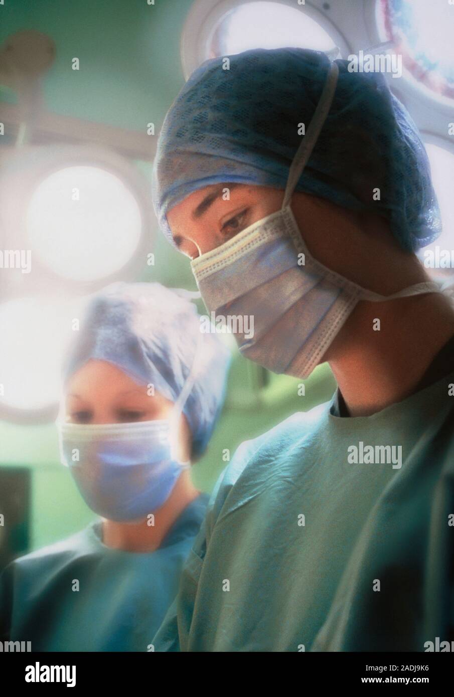 Surgeon during surgery in an operating theatre Stock Photo - Alamy