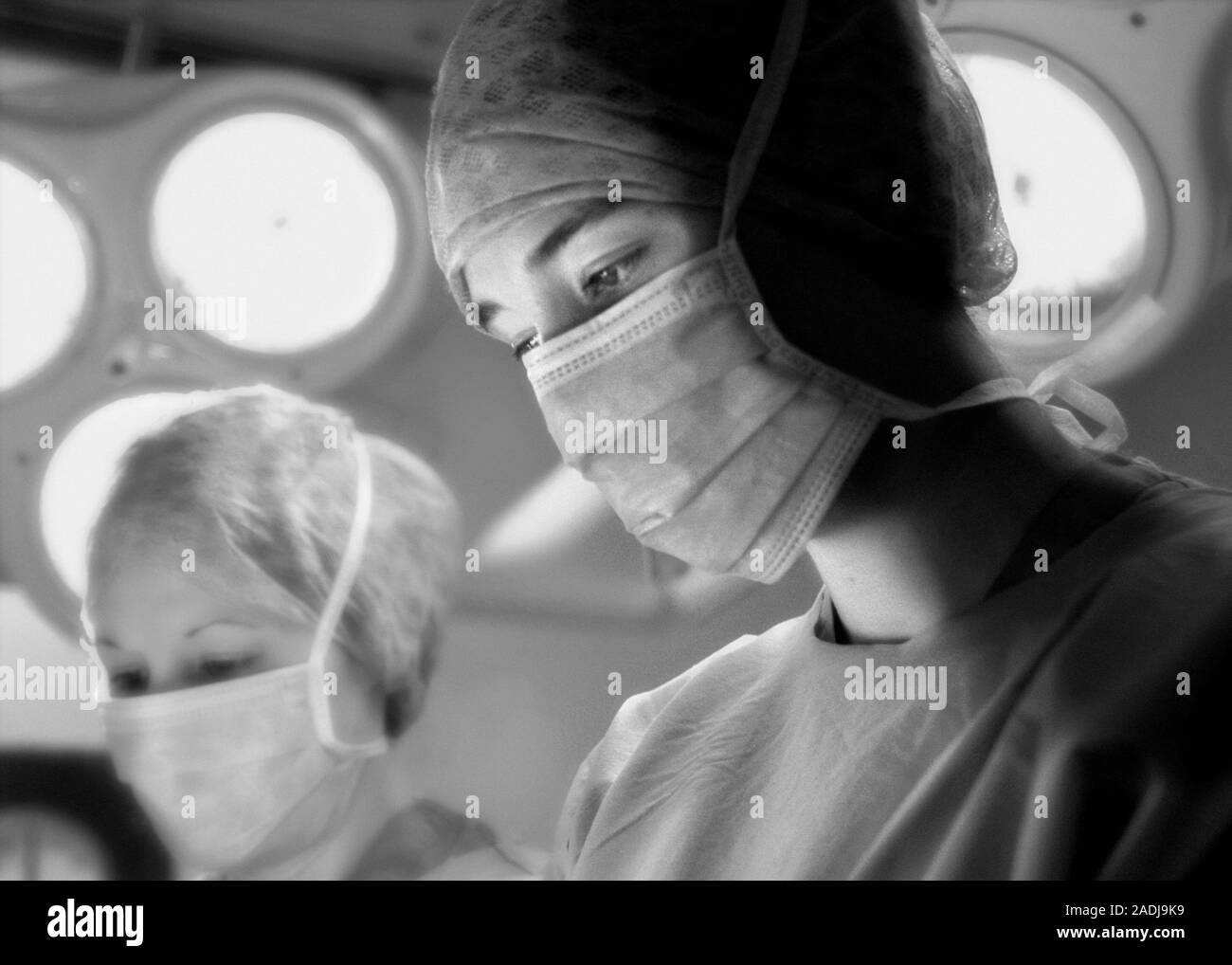 Surgeon during surgery in an operating theatre Stock Photo - Alamy