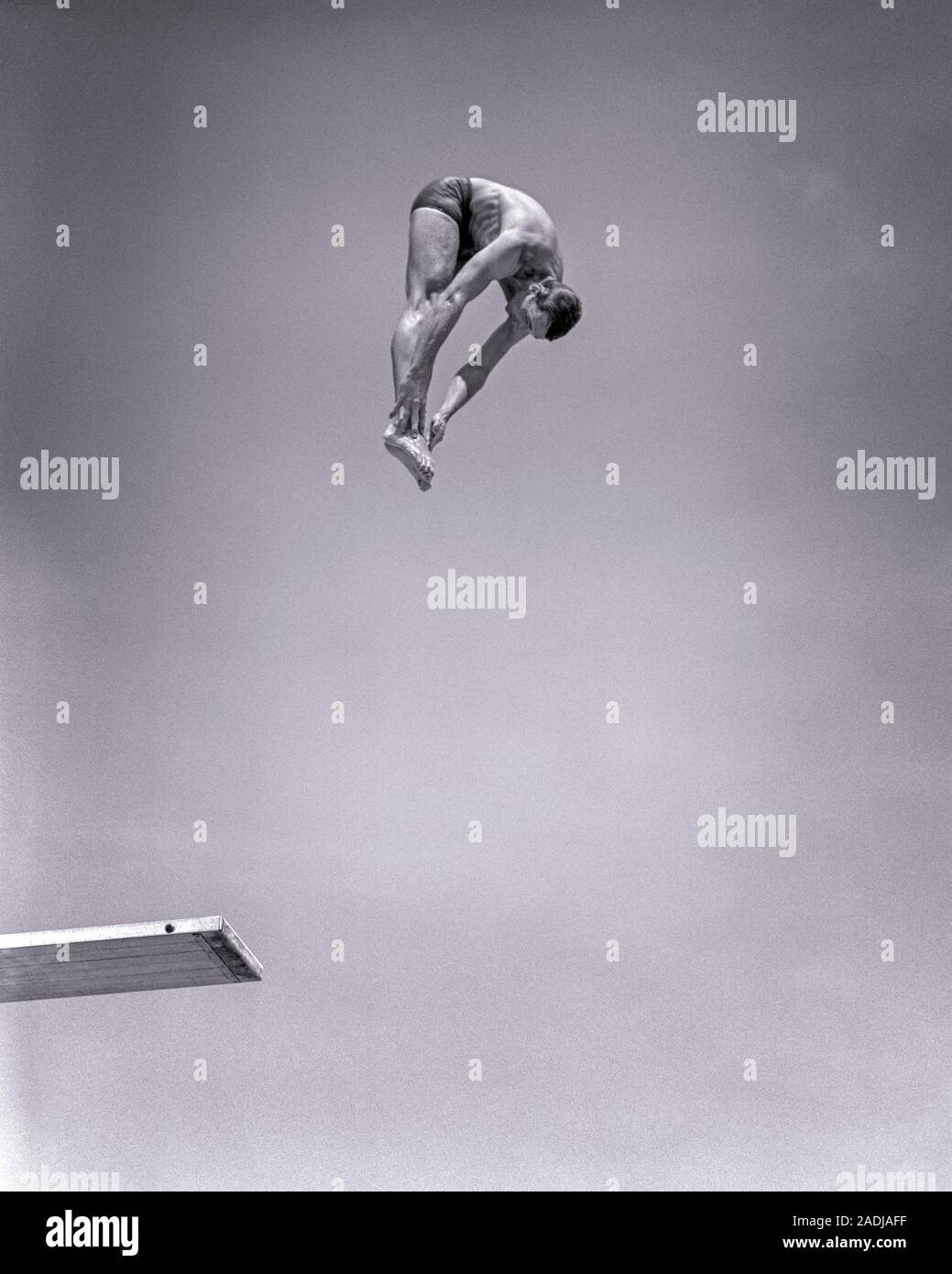 Forward dive in pool hi-res stock photography and images - Alamy