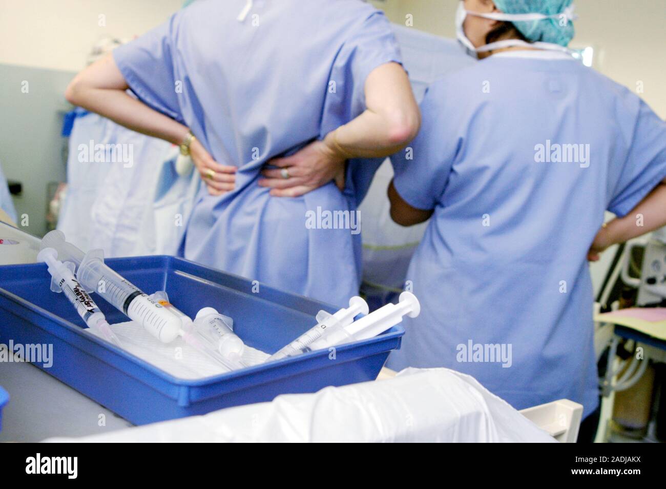 MODEL RELEASED. Anaesthetics. Tray of syringes labelled with drugs for ...