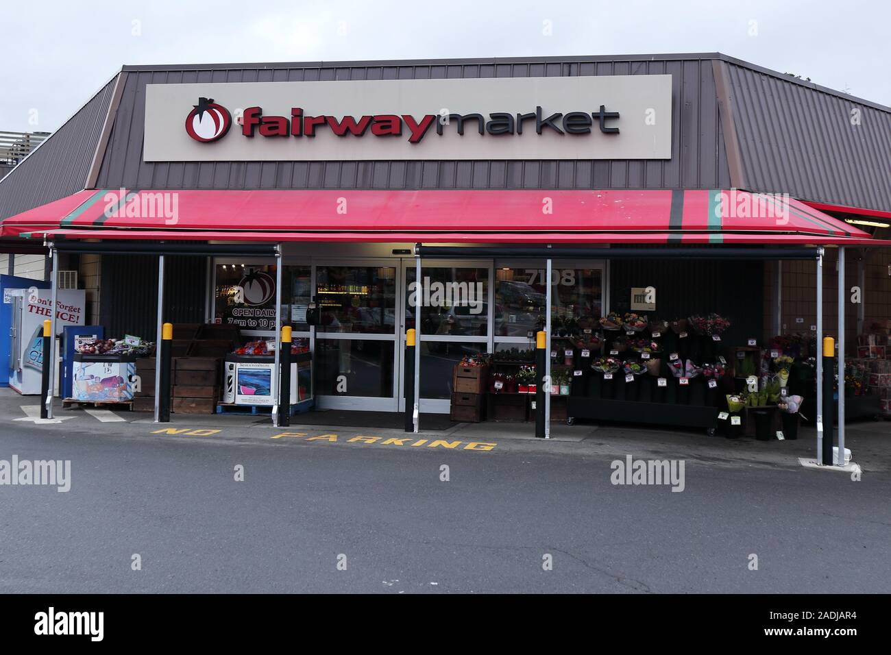 Fairway Market storefront with flowers, groceries, and sliding doors ...