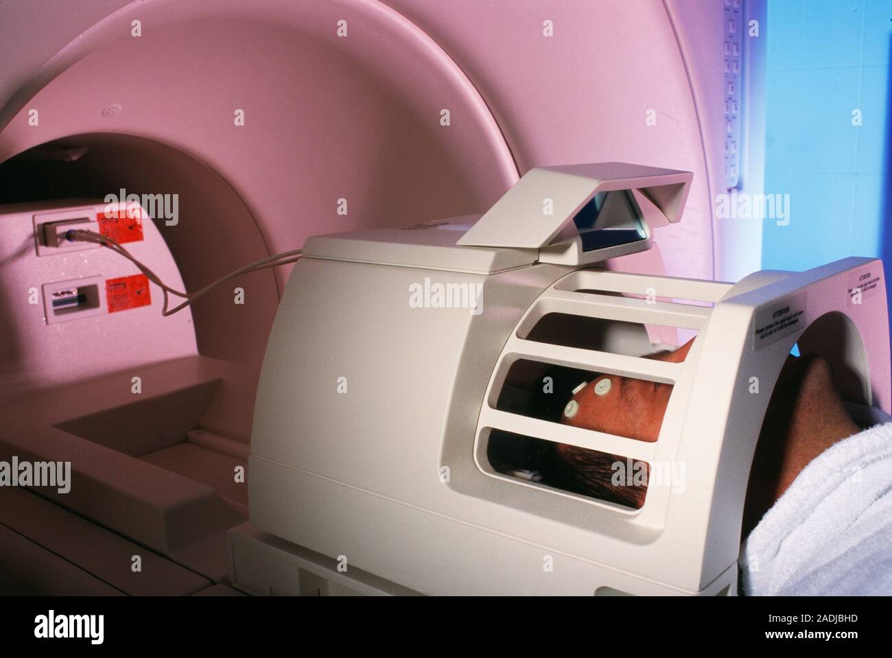 MRI scan for surgical brain modelling. Patient undergoing an MRI ...