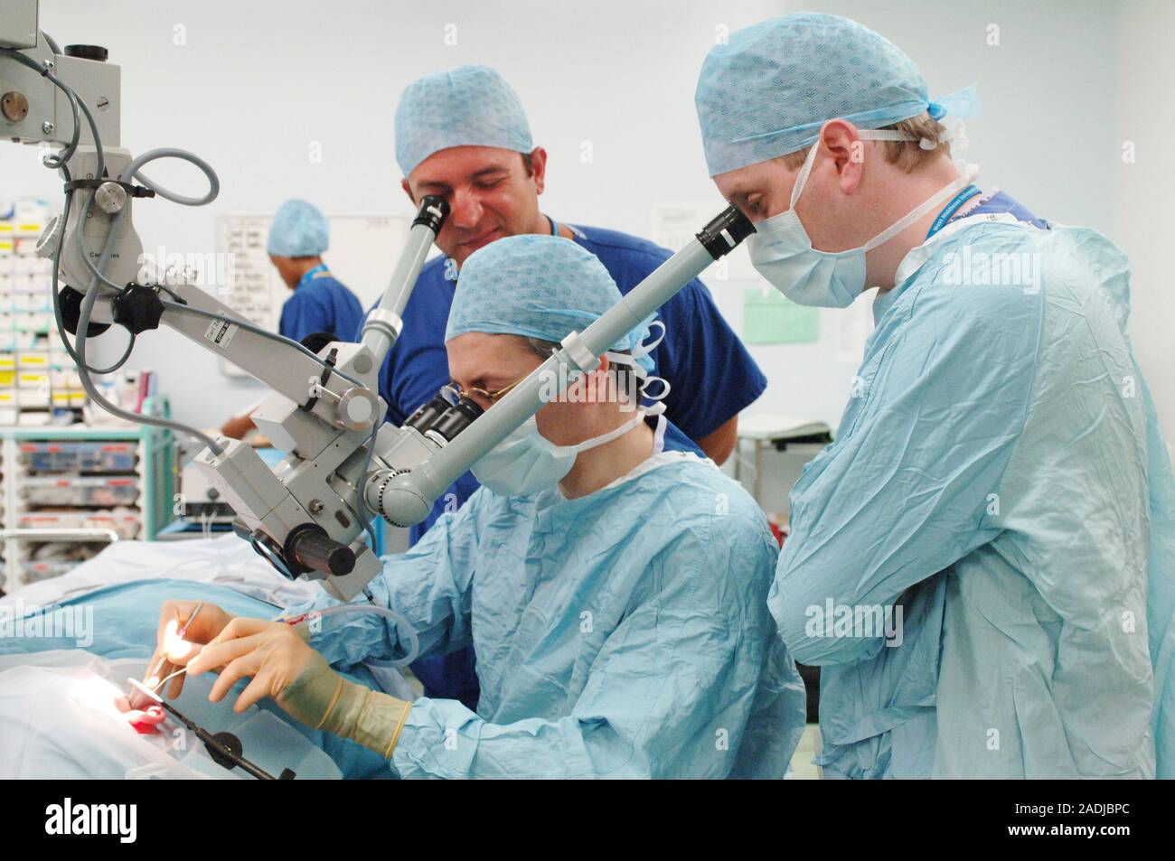 MODEL RELEASED. Eardrum surgery. Image 1 of 6. Surgeon preparing a ...