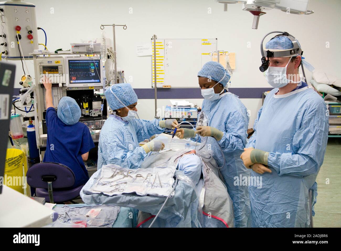 Sinus surgery. Surgeons performing functional endoscopic sinus surgery ...