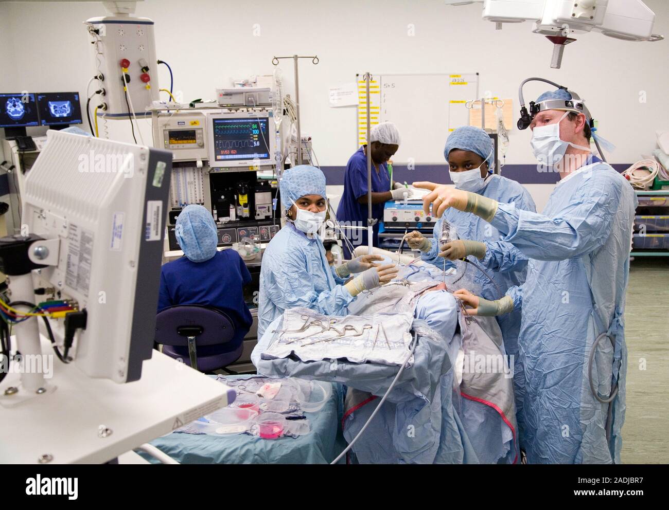 Sinus surgery. Surgeons performing functional endoscopic sinus surgery ...