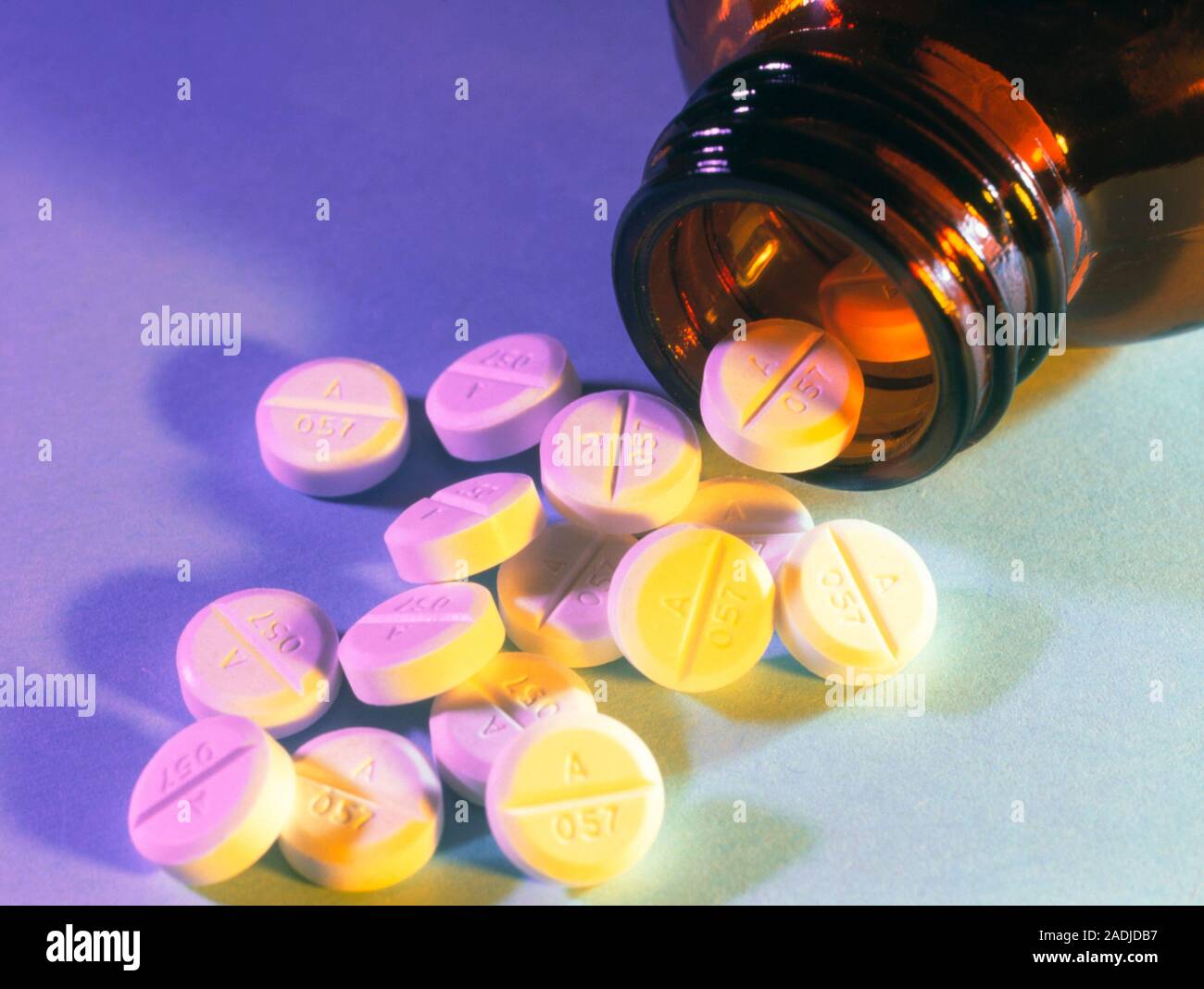 Penicillin tablets. Tablets of the antibiotic drug penicillin spilling ...