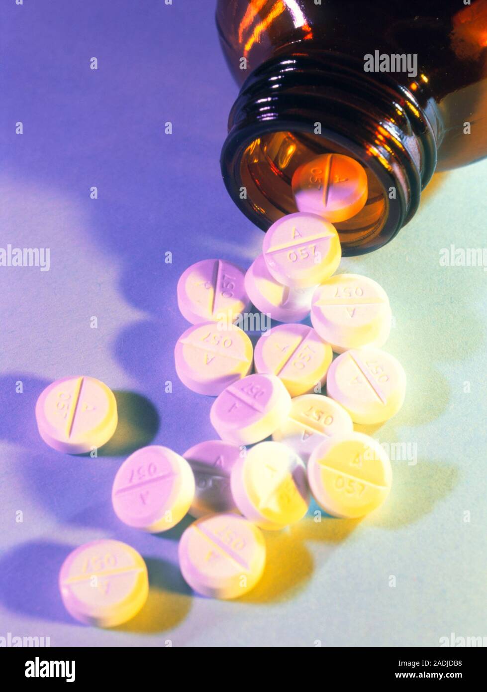 Penicillin tablets. Tablets of the antibiotic drug penicillin spilling ...