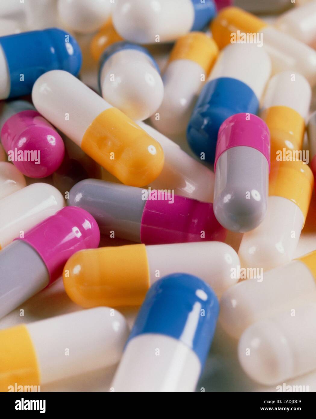 Drug capsules. View of an assortment of time- release drug capsules ...