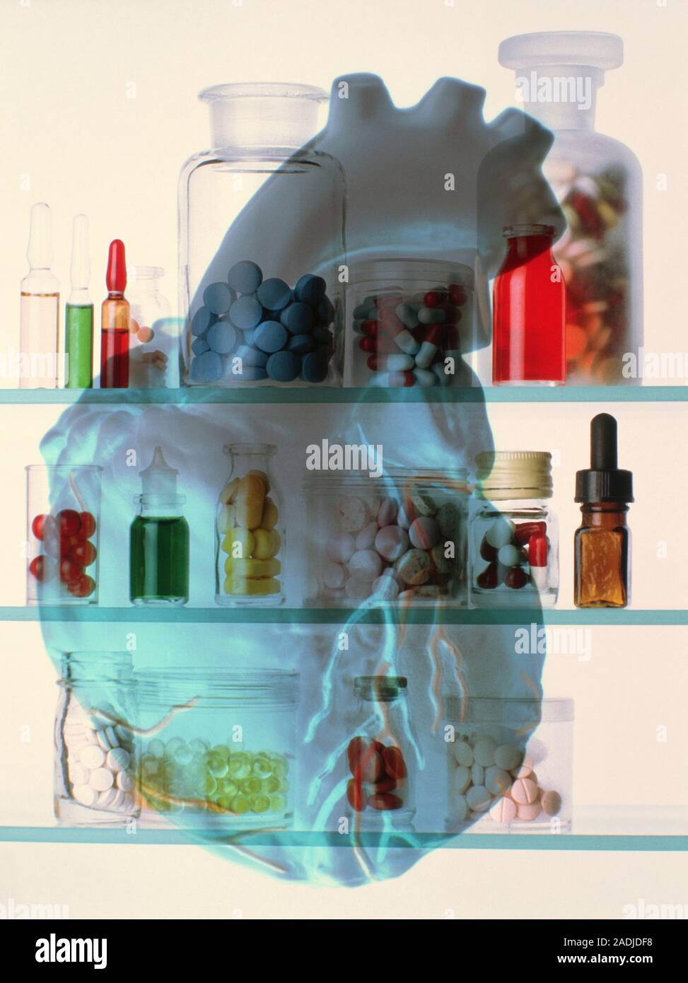 Heart drugs. Composite image of a human heart and an assortment of ...