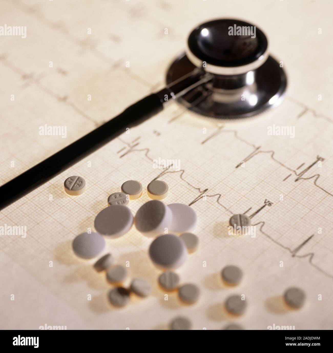 Heart medication. Assortment of pills with a stethoscope and ...