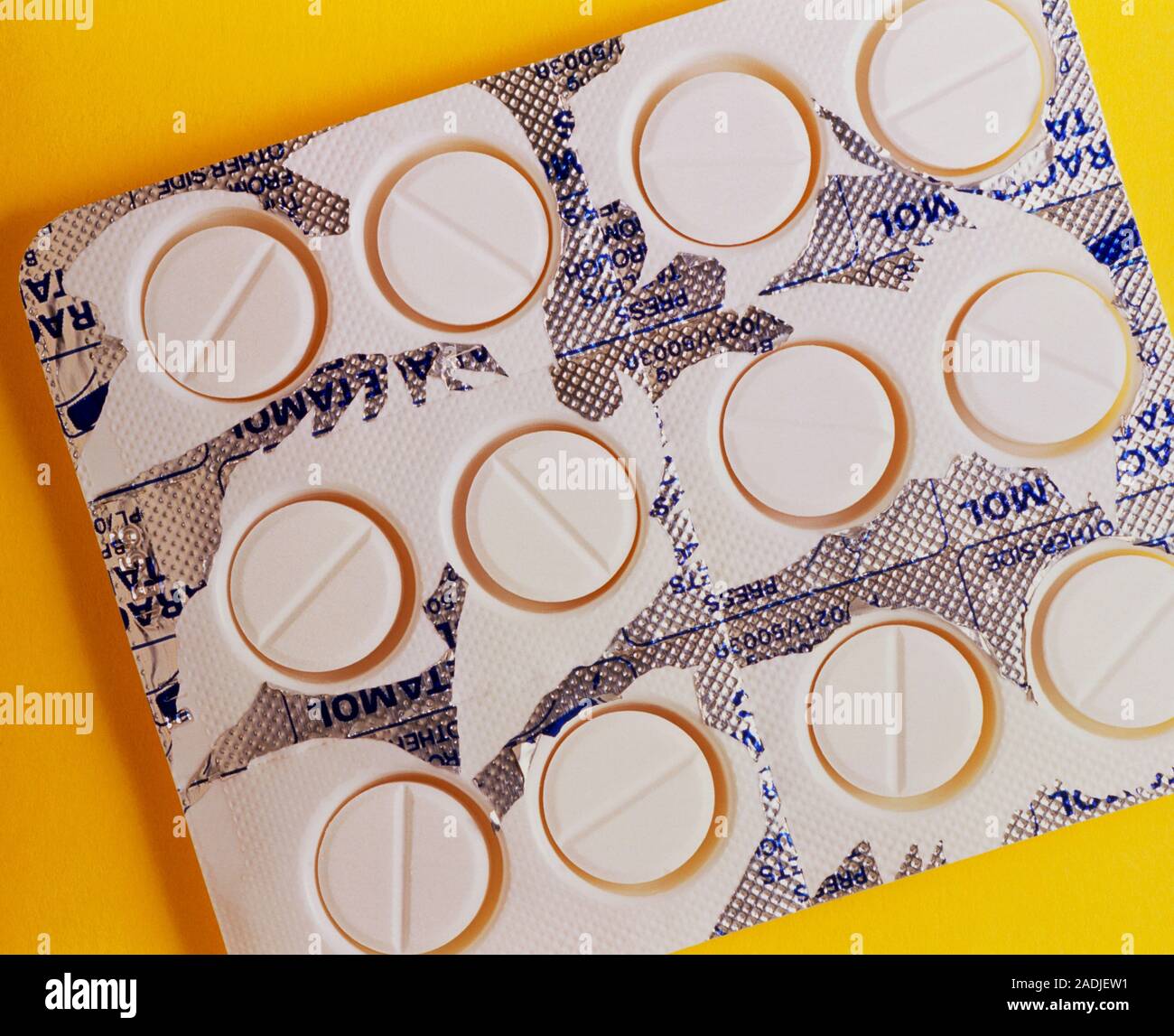 Analgesic pills. Macrophotograph of painkiller (analgesic) tablets in ...