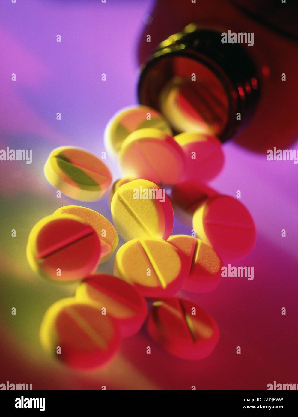 Painkiller drug. Bottle of spilled pills of a common analgesic ...