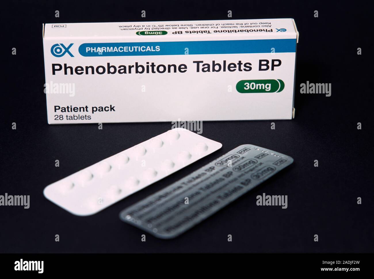 Epilepsy pills. Box and blister packs of Phenobarbitone pills used to ...