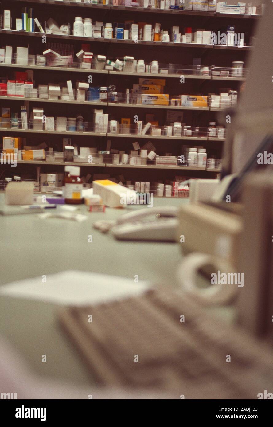 Pharmacy. Shelves containing bottled and packaged prescription ...