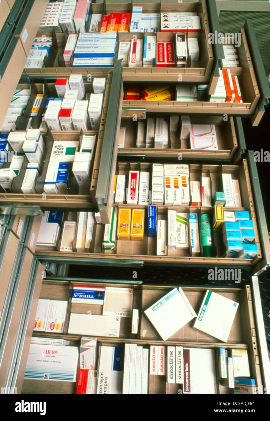 Drug boxes. View of several boxes of assorted drugs in drawers in a ...