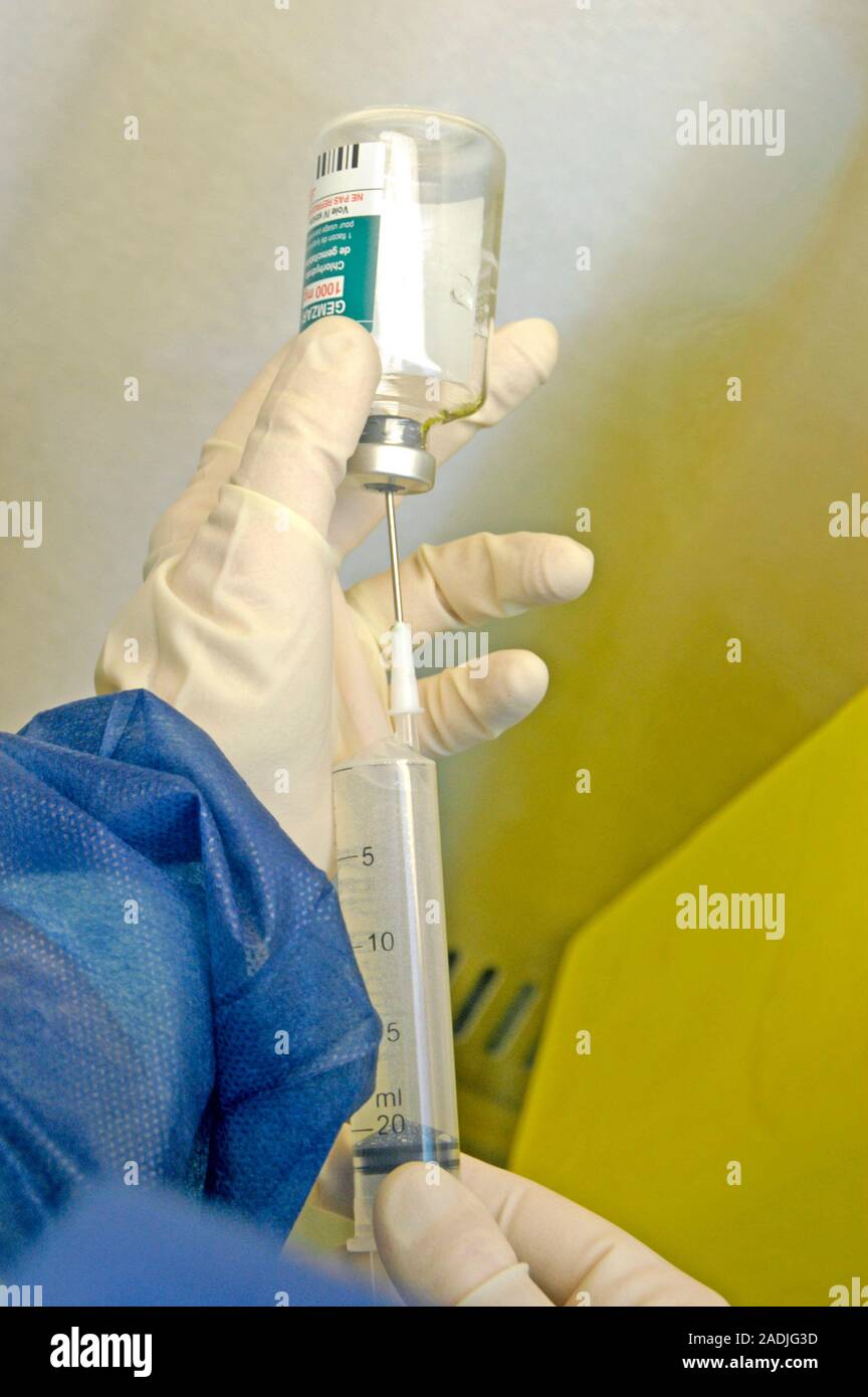 MODEL RELEASED. Cancer drug. Hospital nurse preparing drugs to be used ...