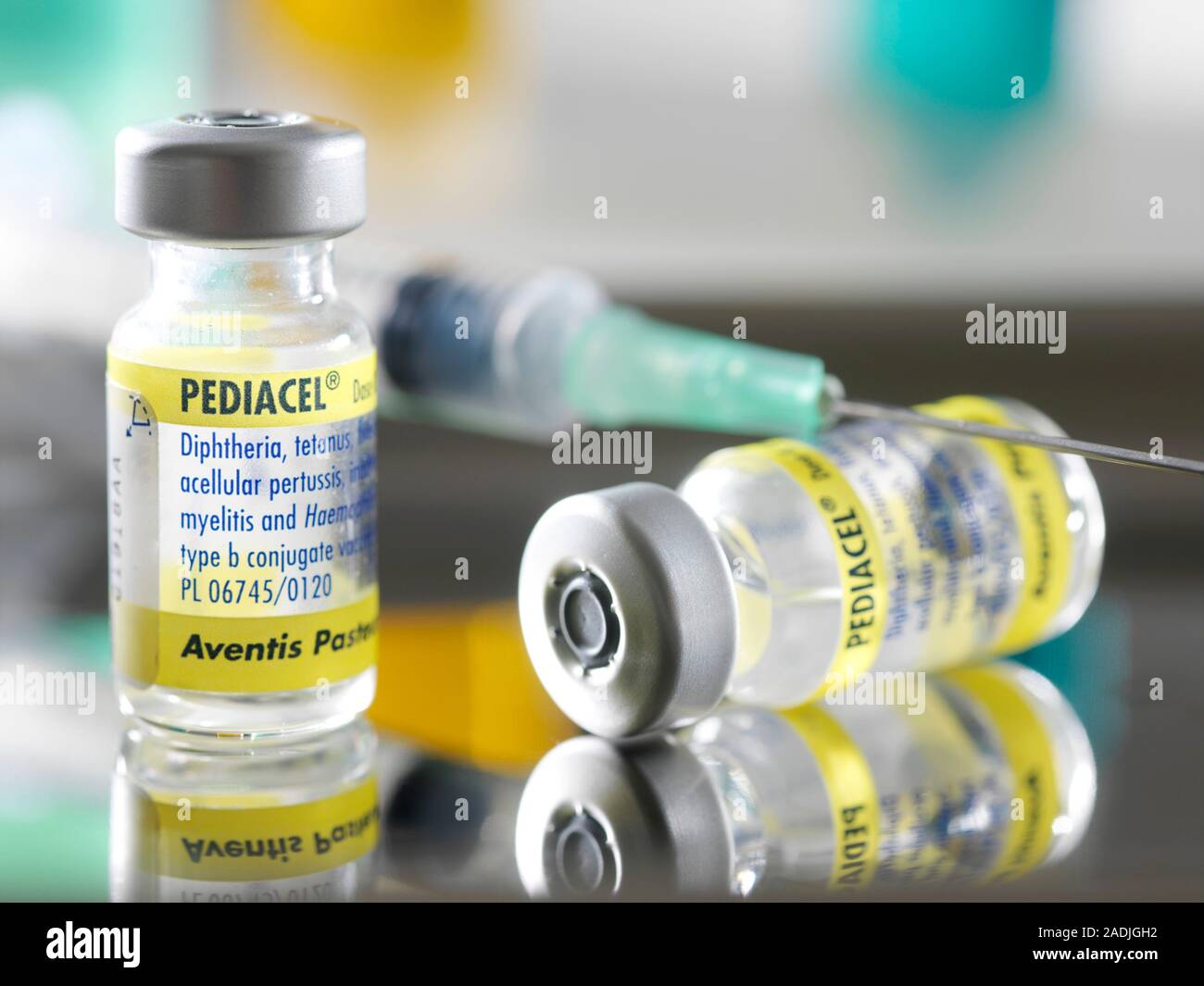 Pediacel vaccine. Syringe and vials on a counter. This combination ...
