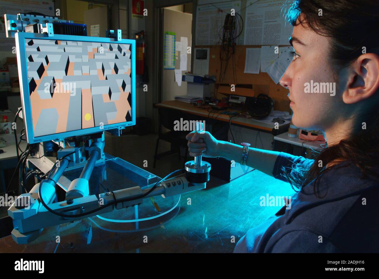 Robot physiotherapy. Robotic arm being used in upper limb physiotherapy ...