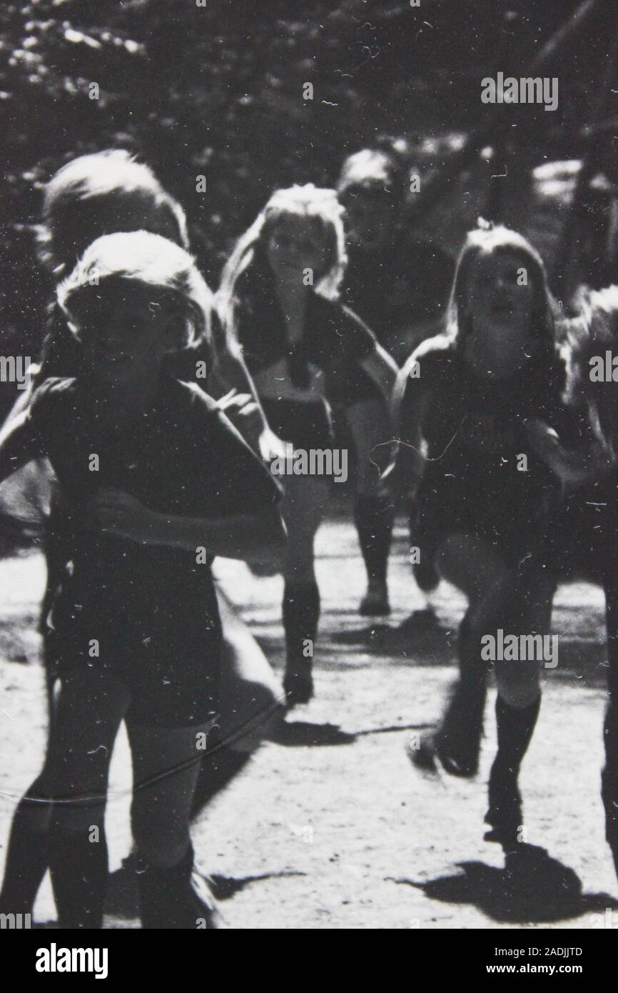 1970s kids running hi-res stock photography and images - Alamy