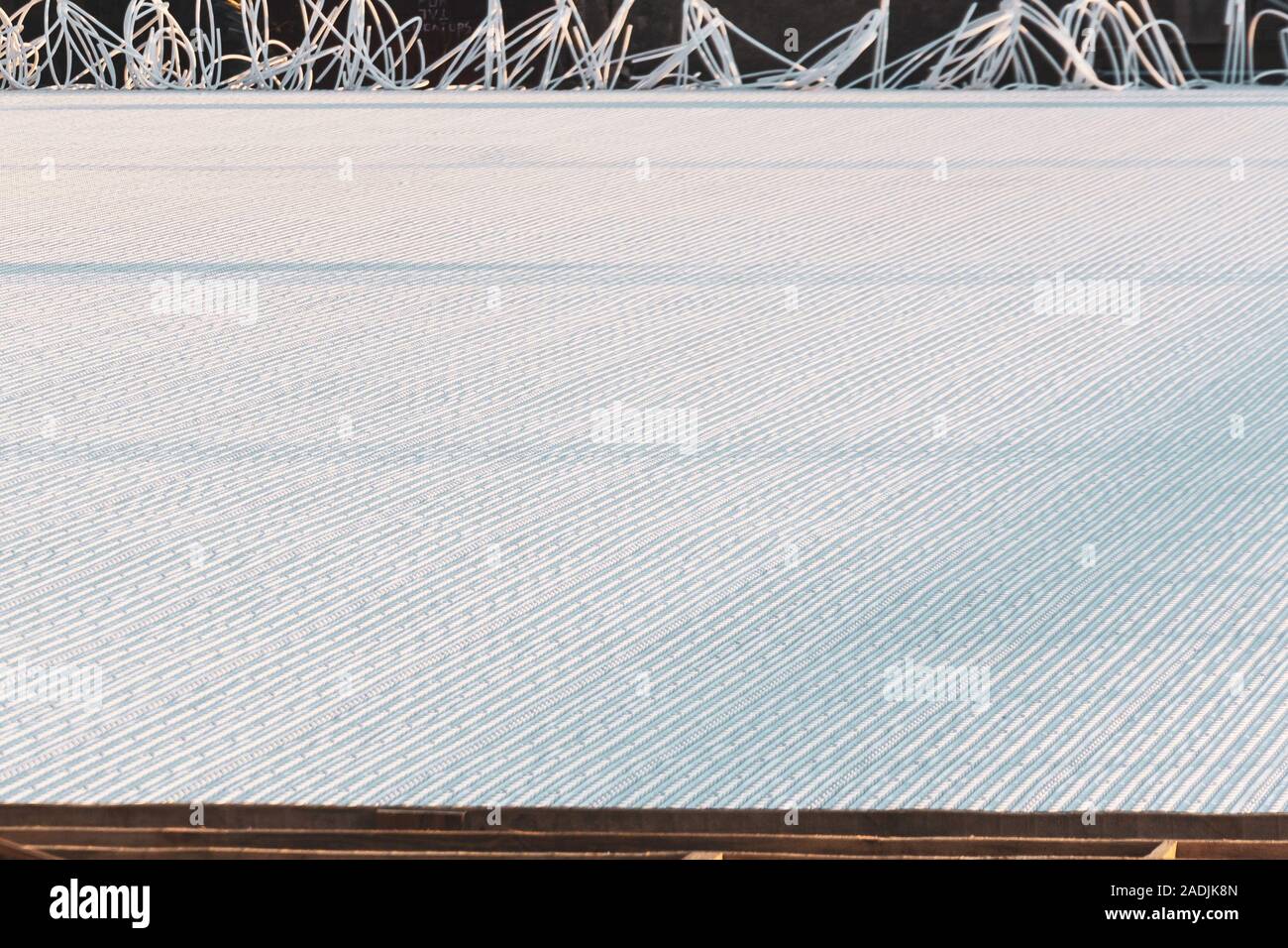 Pouring artificial ice cover in the open air Stock Photo - Alamy
