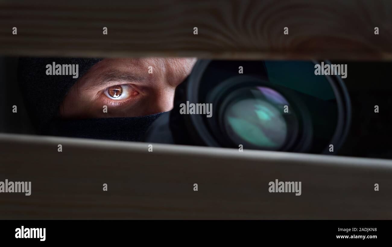Espionage concept. Privacy idea. Private life. Detective with camera ...
