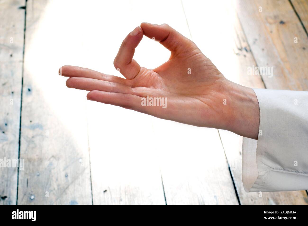 Yoga hand position. This is the hand sign made in the gyan mudra ...