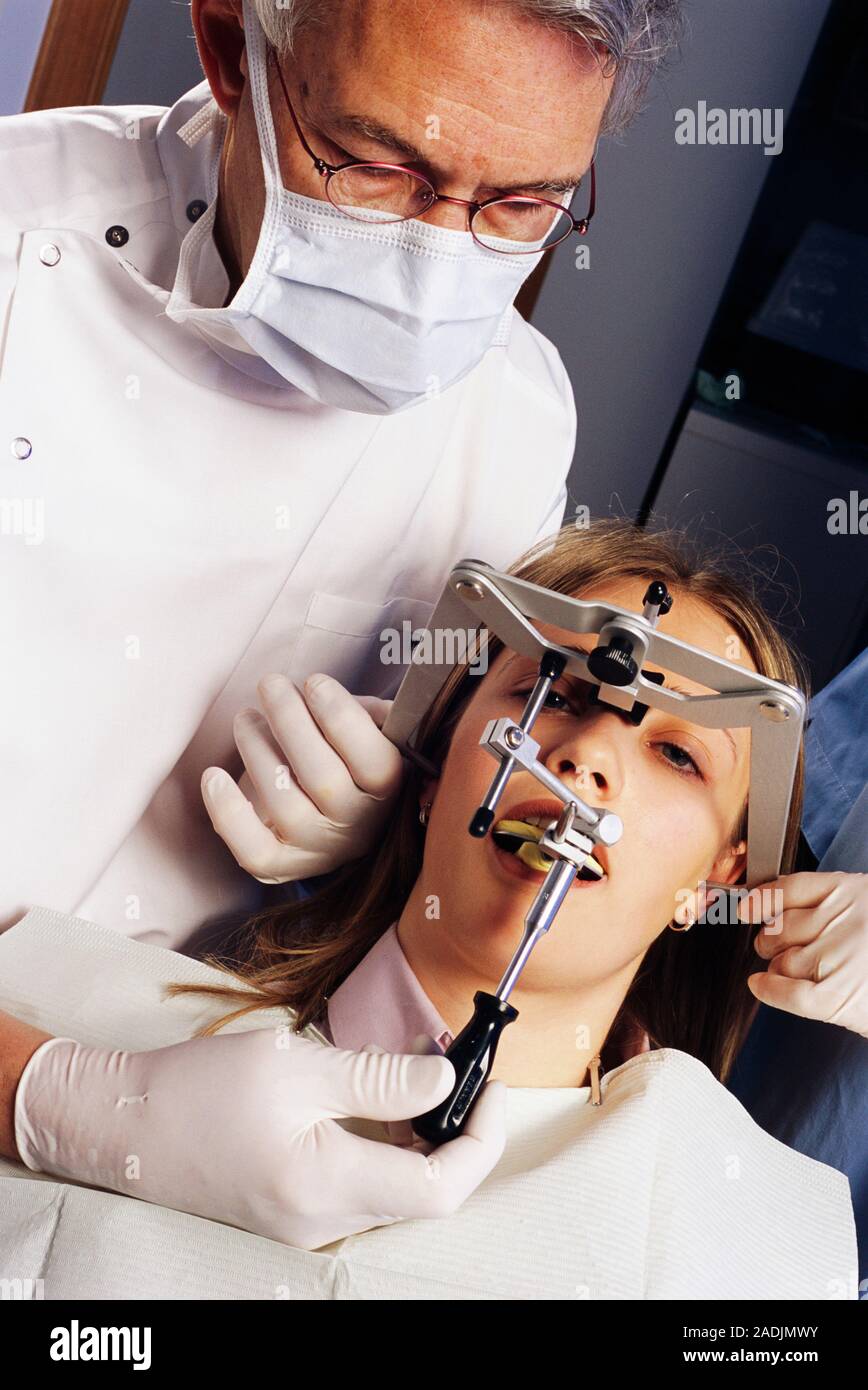 Tooth mould. Dental patient having a mould made of her teeth ...