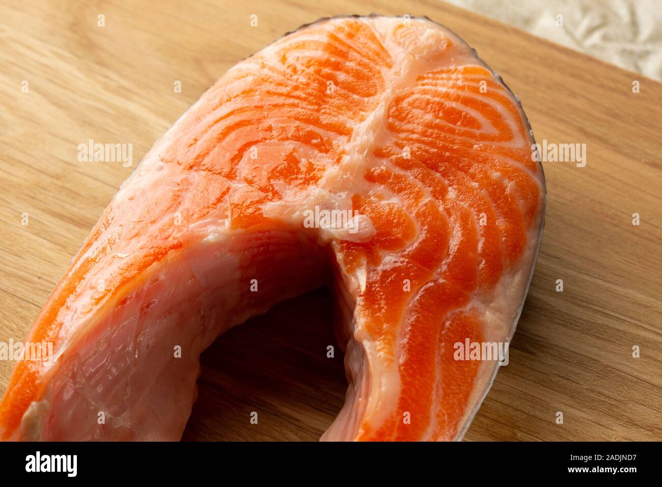 Raw red fish looking fresh while lying on wooden surface Stock Photo ...