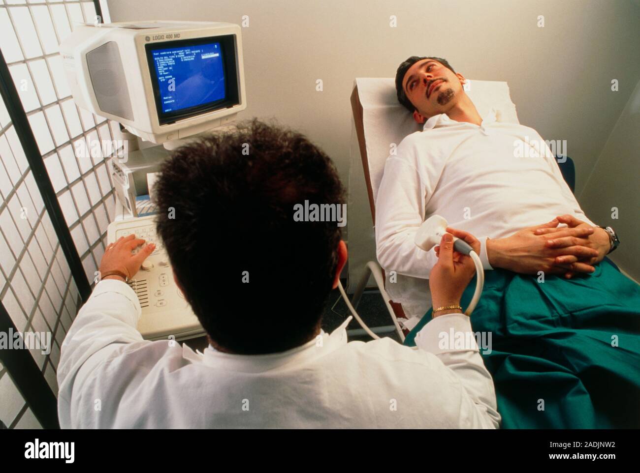 Artificial insemination (image 4 of 9). Man having an ultrasound scan ...
