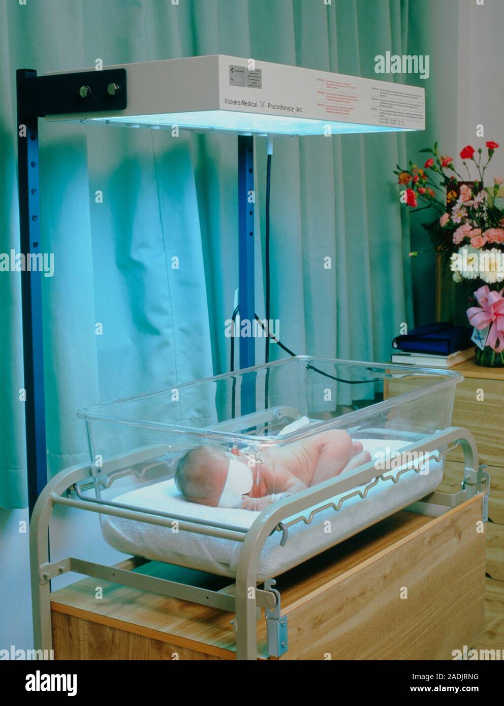 Model released. For editorial use only. Newborn baby undergoing ...