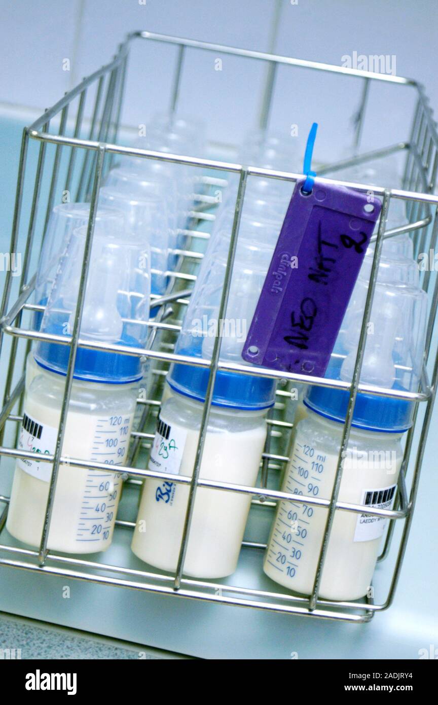 MODEL RELEASED. Bottles of milk for premature babies. Photographed on ...