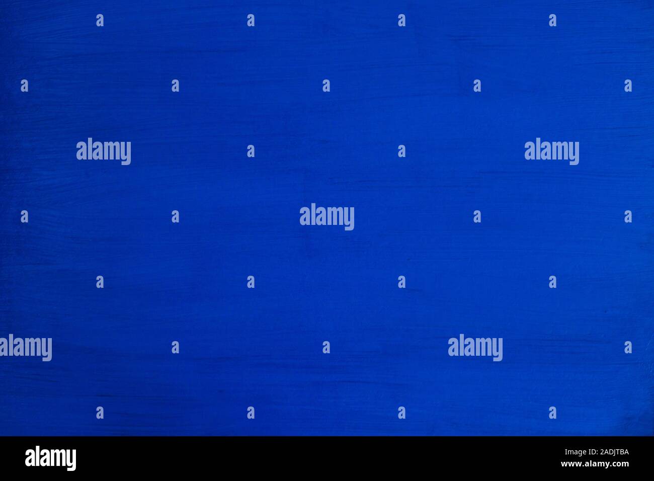 The wall is painted with a blue paint paint structure like a background ...
