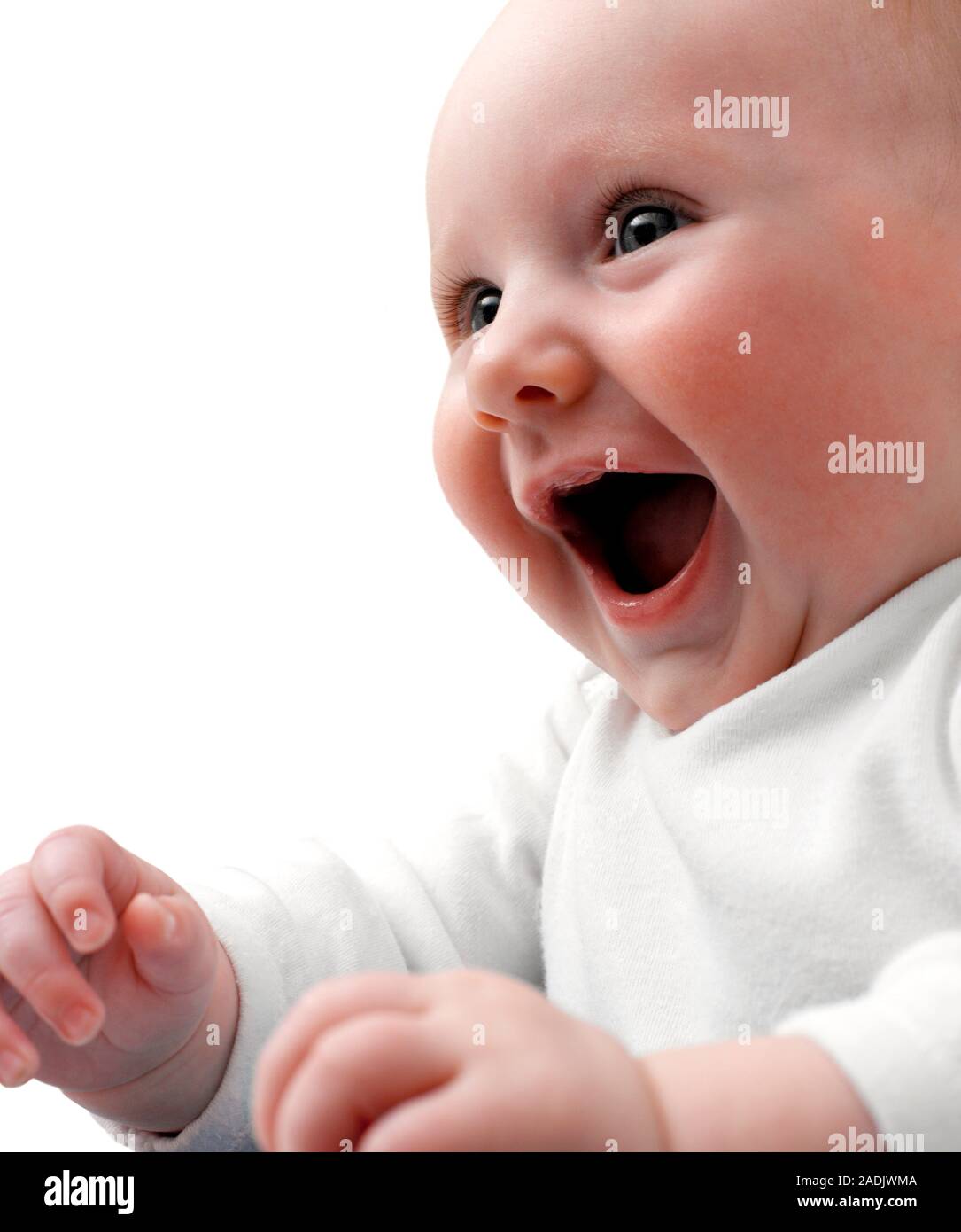 MODEL RELEASED. Four month old baby boy laughing Stock Photo - Alamy