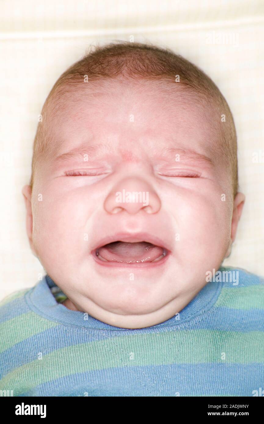 MODEL RELEASED. Crying baby. Face of a crying baby Stock Photo - Alamy