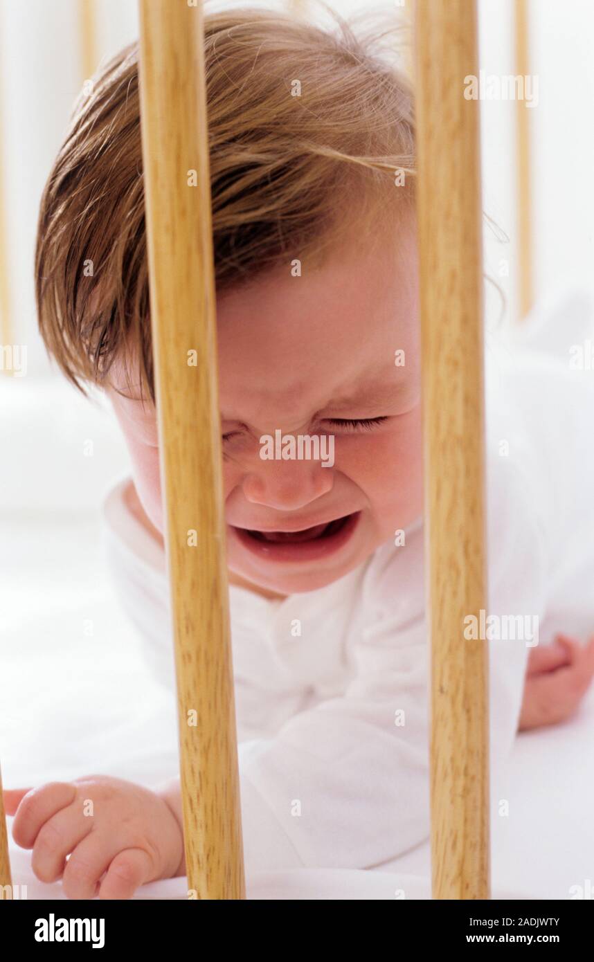 MODEL RELEASED. Crying baby girl Stock Photo - Alamy