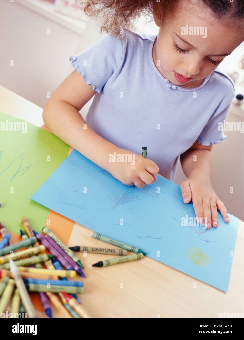MODEL RELEASED. Girl drawing. Three year old girl drawing Stock Photo ...