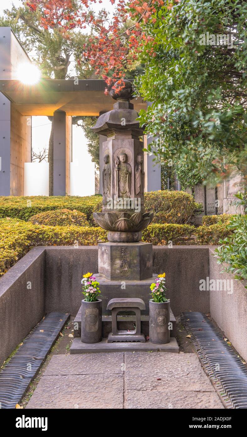 Six Jizo statues on an hexagonal memorial stone stand where is engraved ...