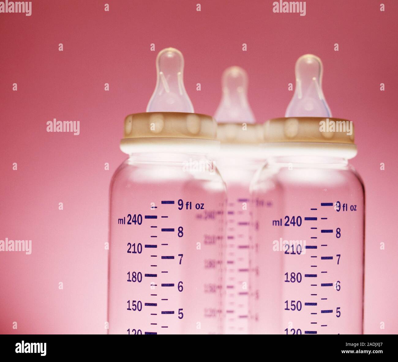 Baby feeding bottles with volume measurements printed in metric (ml ...