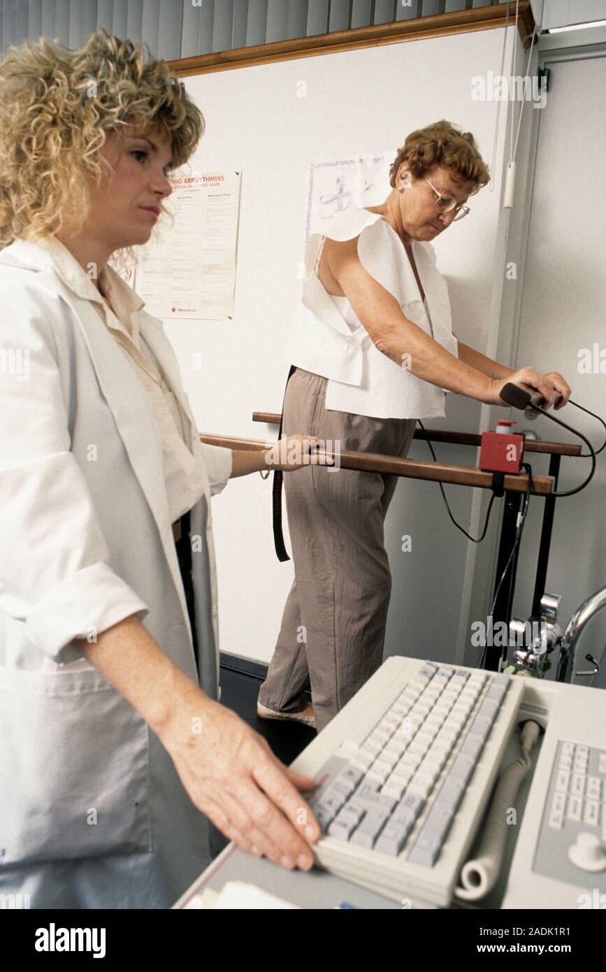 Stress test. View of a woman on a treadmill during a heart stress test ...