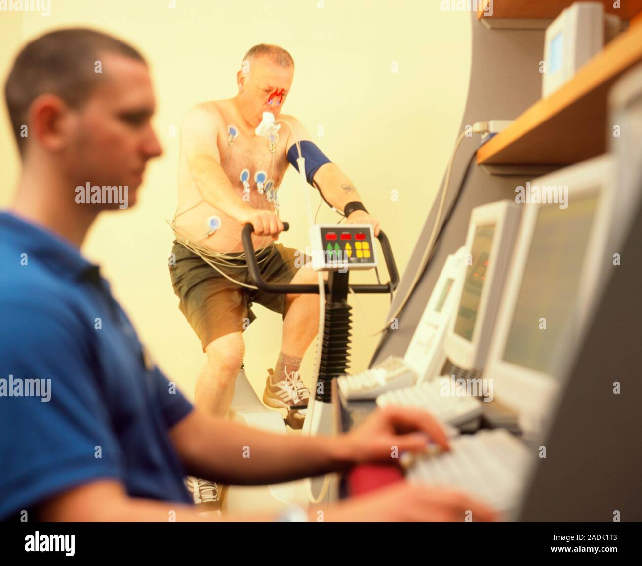 Fitness test. Man taking a cardiovascular fitness test on an exercise ...
