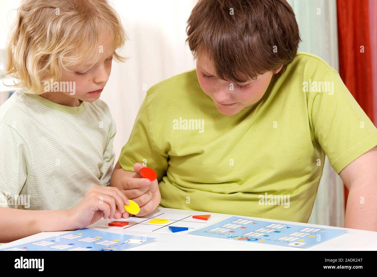 MODEL RELEASED. Children performing a development test. Such tests are ...