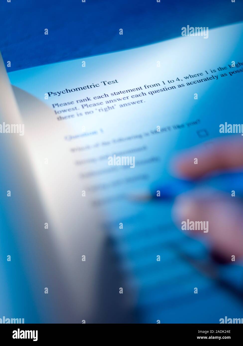 MODEL RELEASED. Psychometric test. Person undertaking a psychometric ...