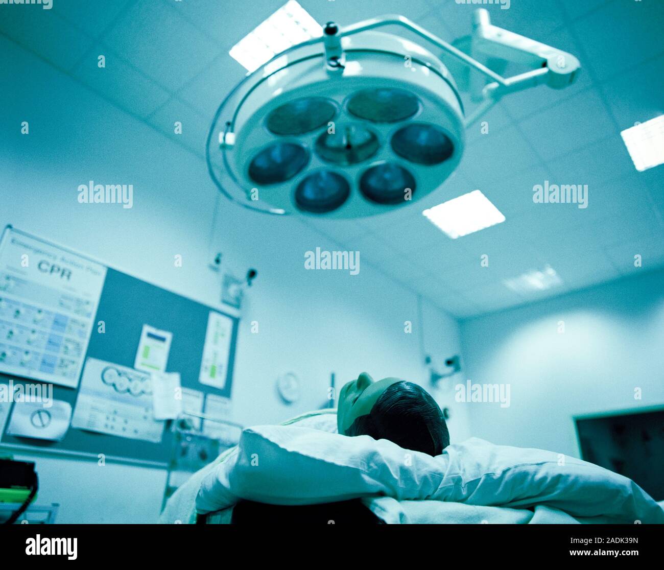 Medical training dummy in a mock operating theatre. This interactive ...