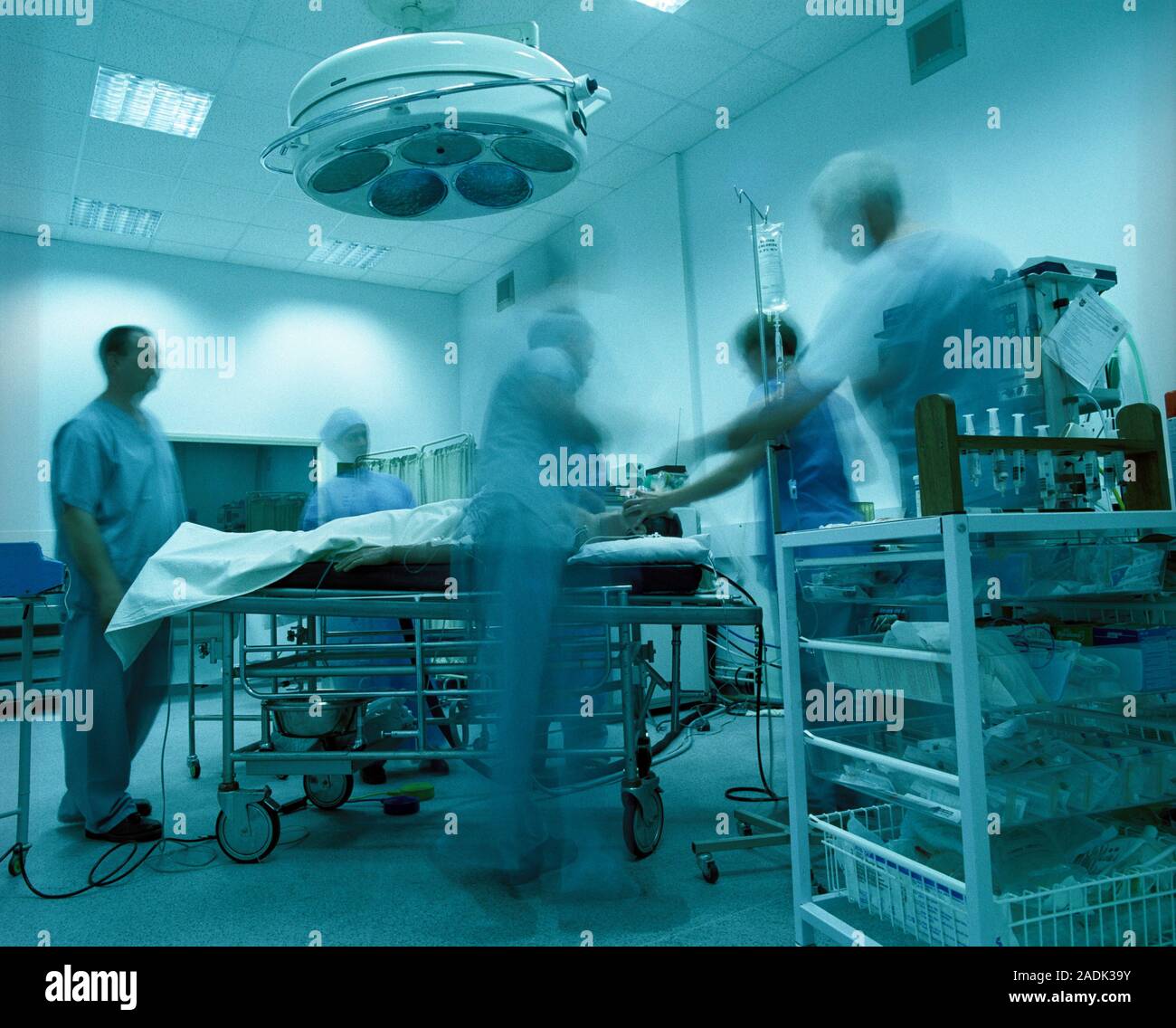 Medical training dummy being treated in a mock operating theatre. This ...