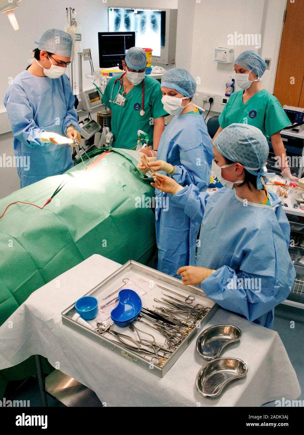 Surgical training with a patient simulator. These medical students are ...