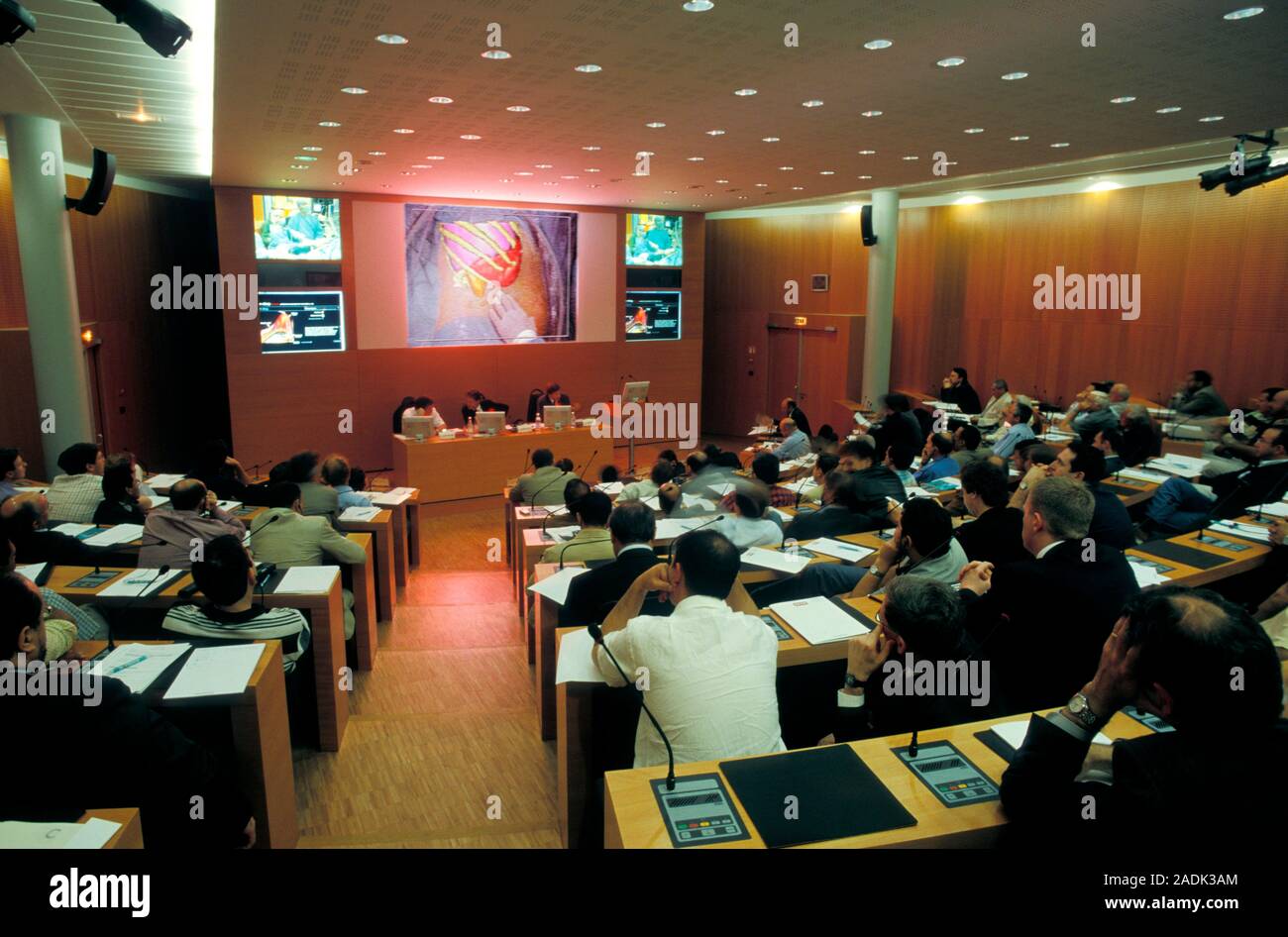 Training in advanced surgical techniques. Surgeons at a training course ...