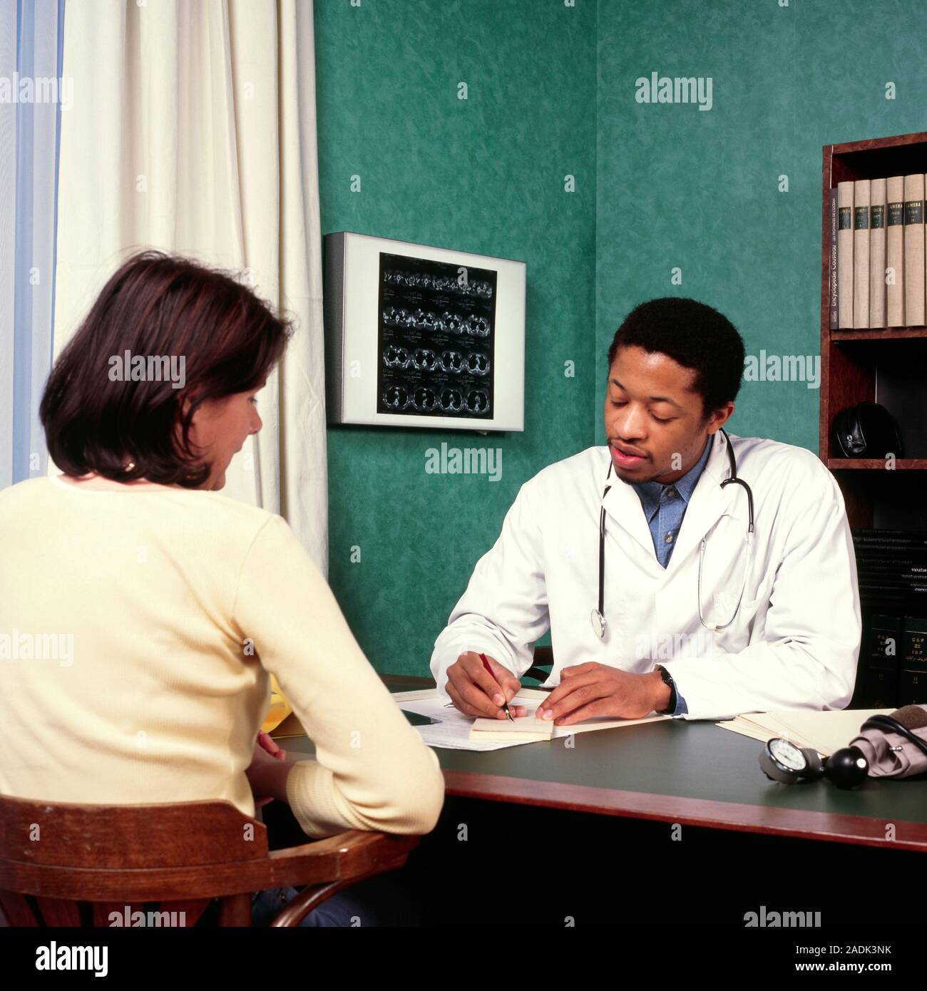 Prescription. General practice (GP) doctor writing a drug prescription ...