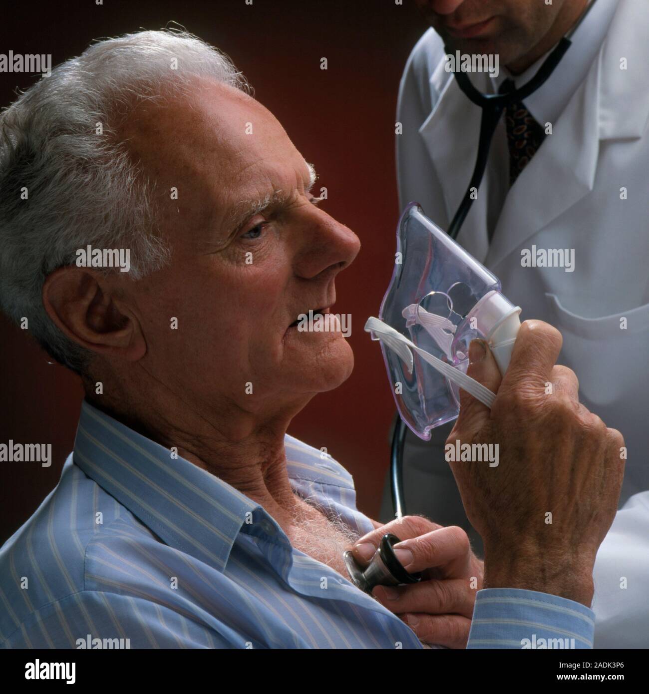 Oxygen therapy. View of a general practice doctor examining an elderly ...