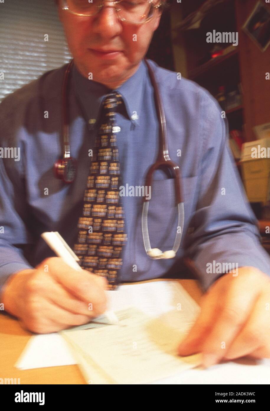 Prescription. General practice doctor writing a drug prescription Stock ...