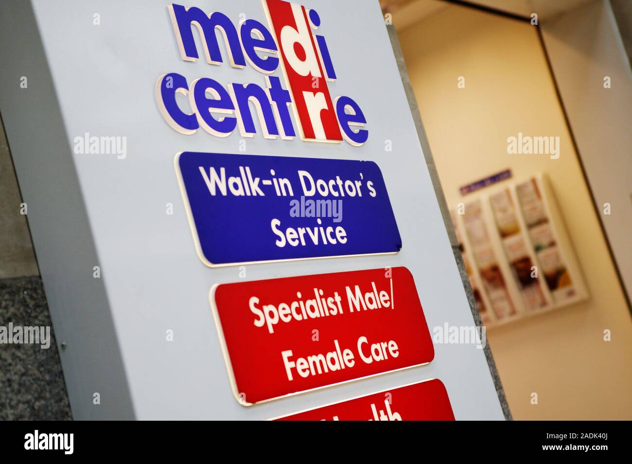 Walk-in medical centre. Sign outside the entrance of a walk-in private ...
